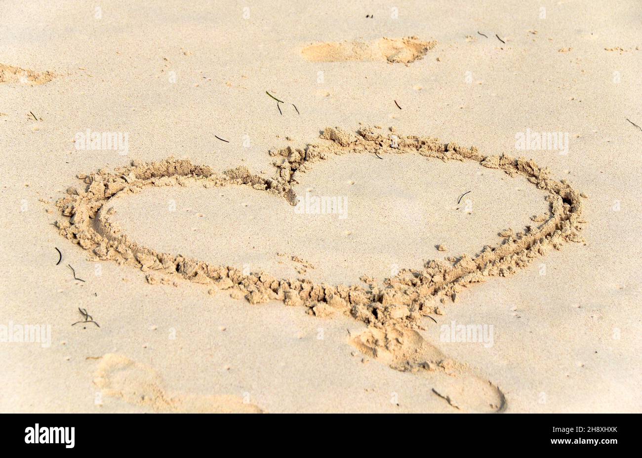 Heart drawn in the sand Stock Photo - Alamy
