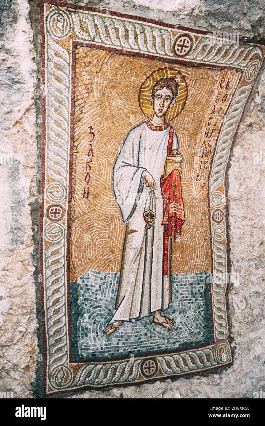 Mosaic depicting a man with a book and a censer in his hands. Ostrog ...