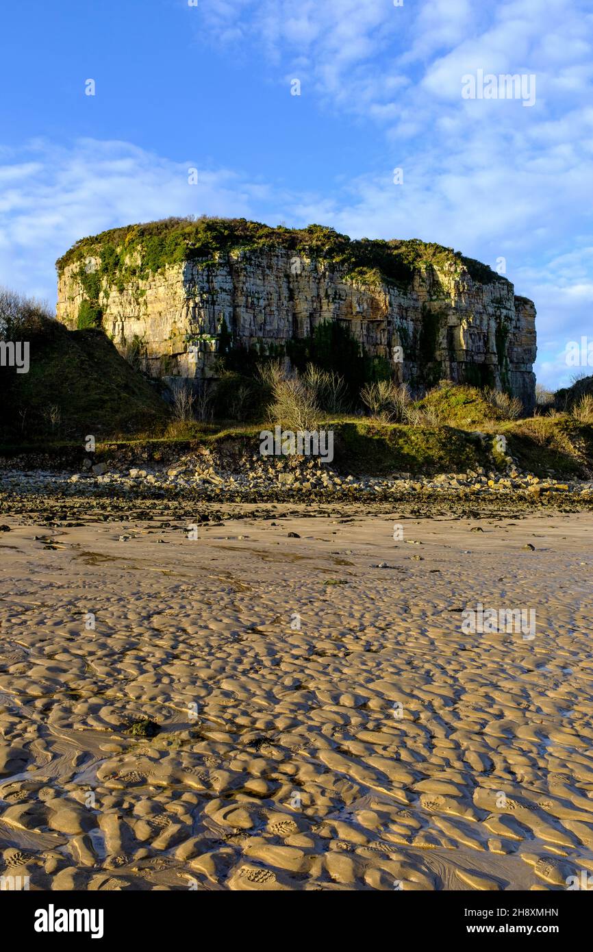 Remains of an eroding cliff face at Red Warf Bay, Anglesey, North Wales ...
