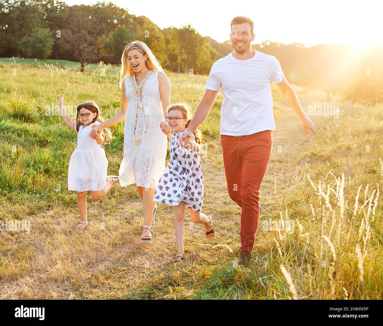 child family outdoor mother woman father girl happy happiness lifestyle ...