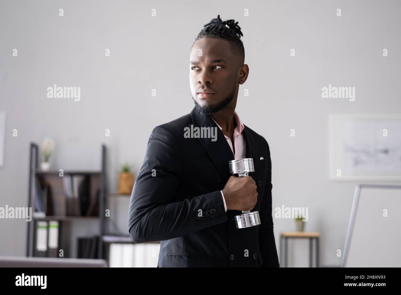 Man At Office Working Out. Workplace Fitness Stock Photo - Alamy