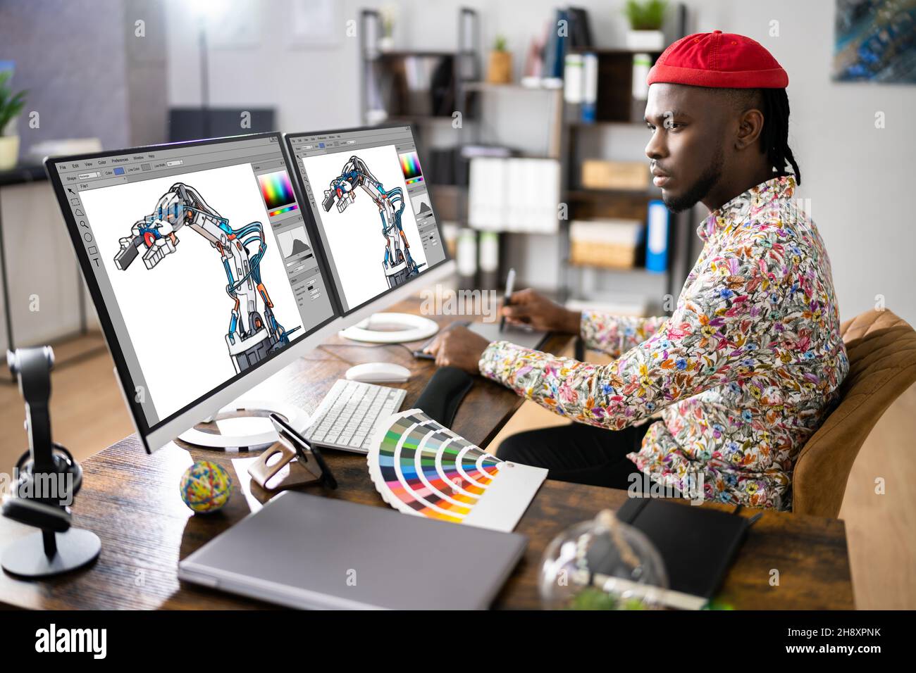 African Graphic Web Designer Using Design Editing Software Stock Photo ...