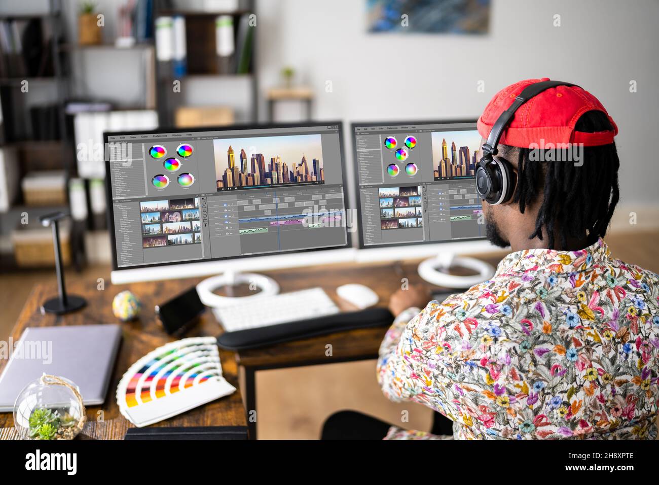 African American Video Editor Tech Job Using Computer Stock Photo - Alamy