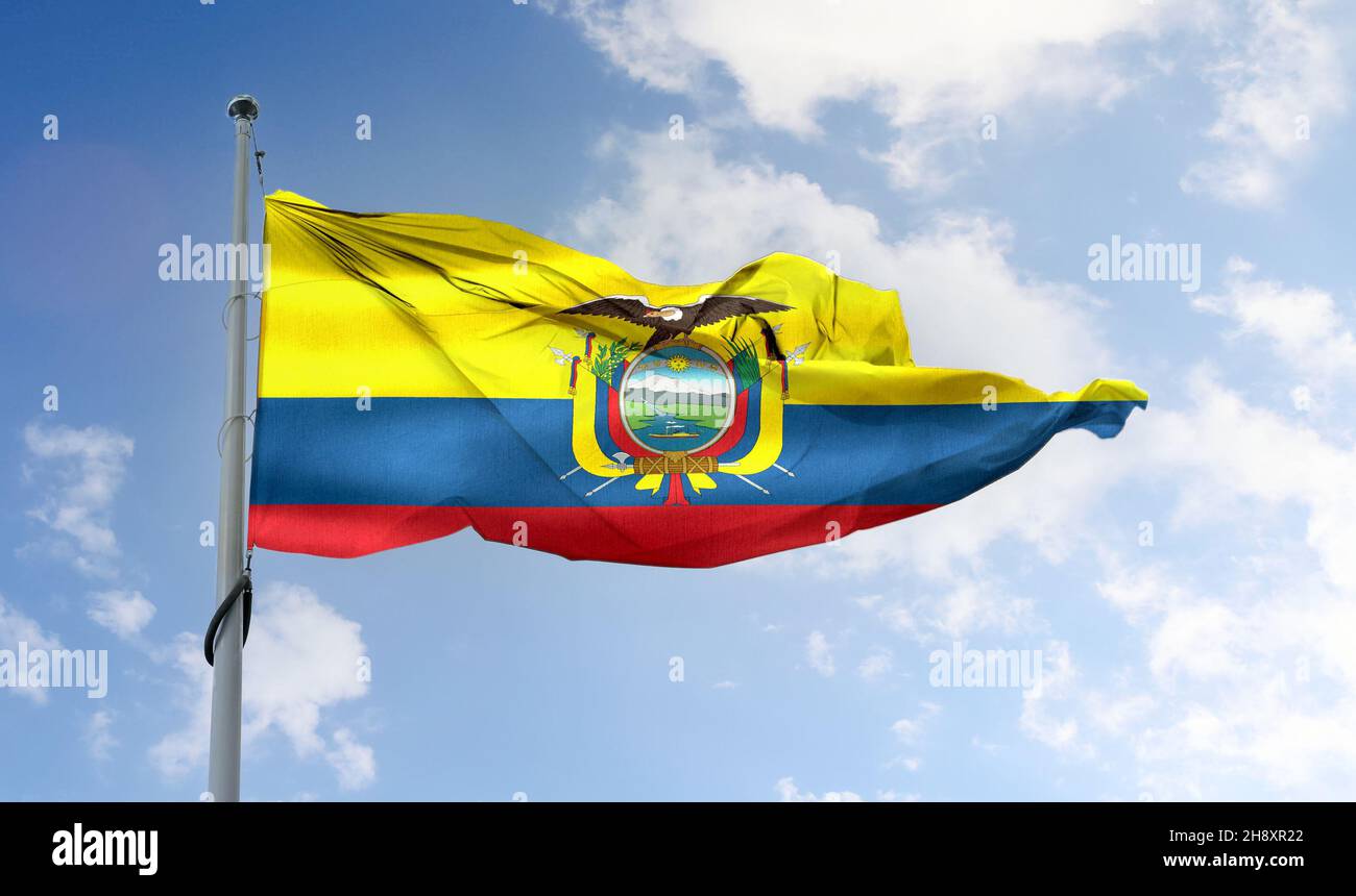 Ecuador flag waving on a pole in a blue sky Stock Photo - Alamy