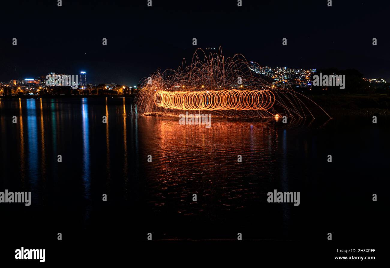 steel wool photo shoot by the sea Stock Photo - Alamy