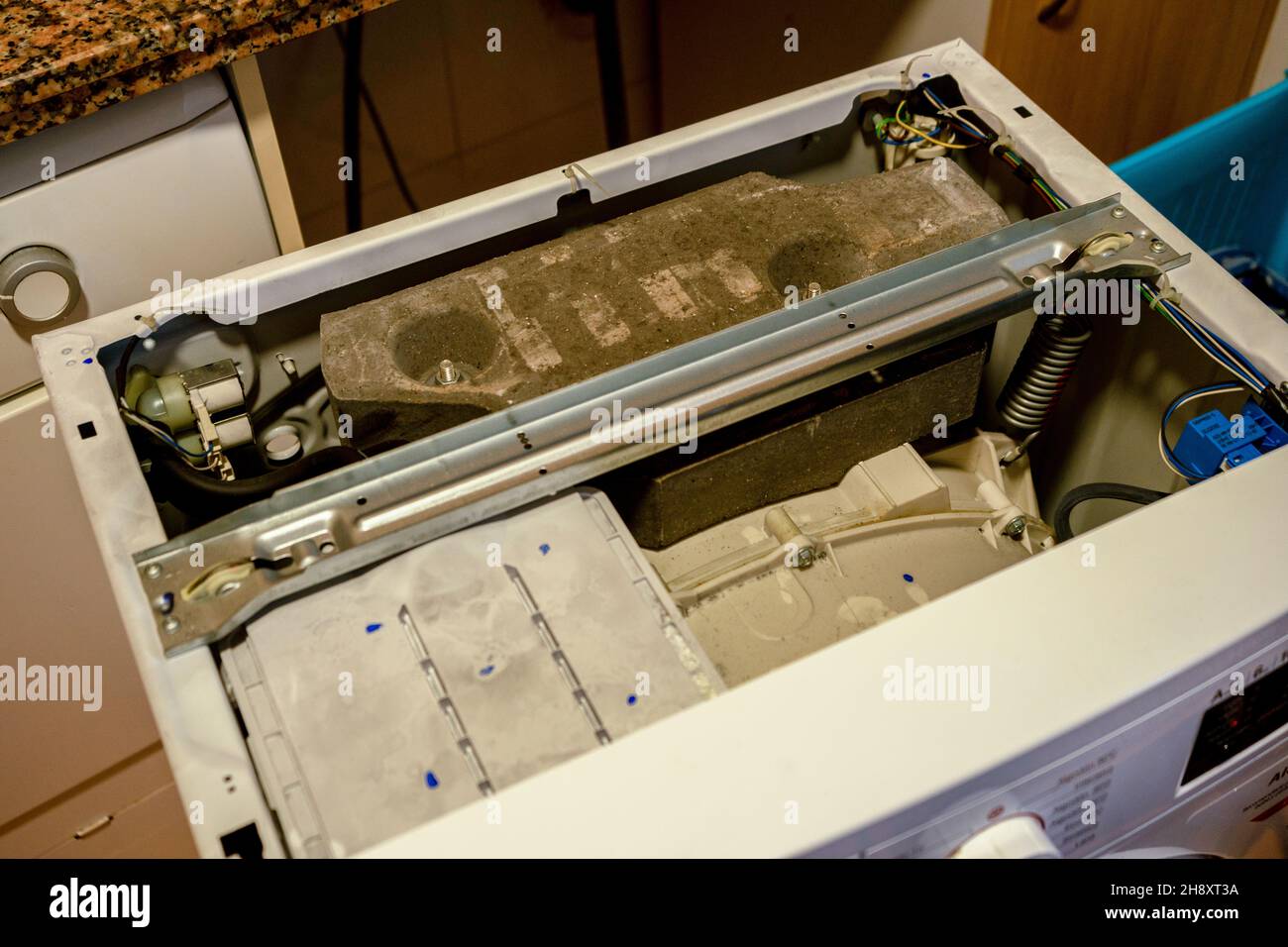 View of the disassembled washing machine to find the fault. Has left ...