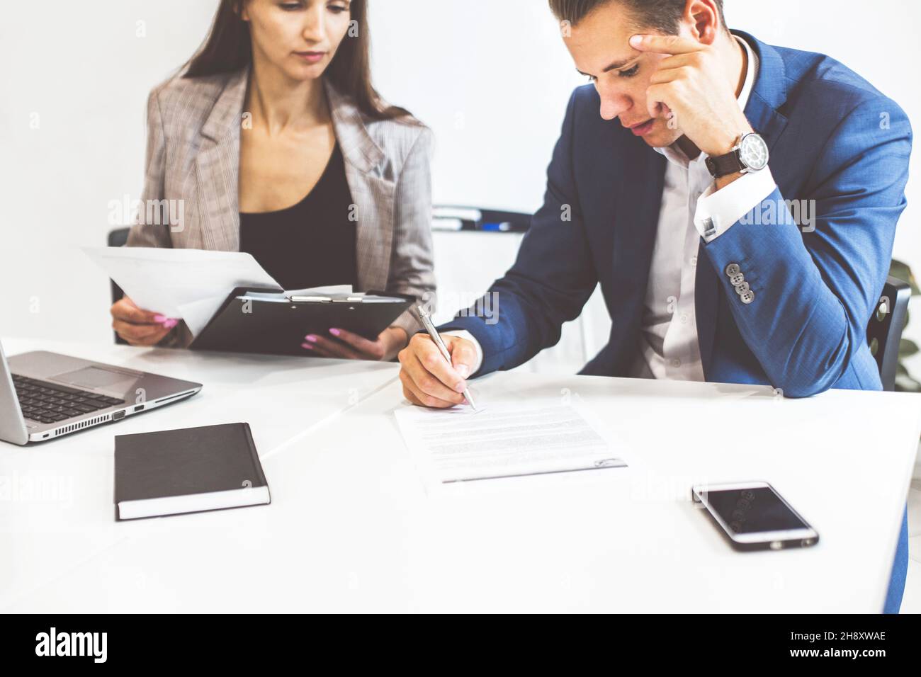 Caucasian man signing contract, hand putting signature on official ...
