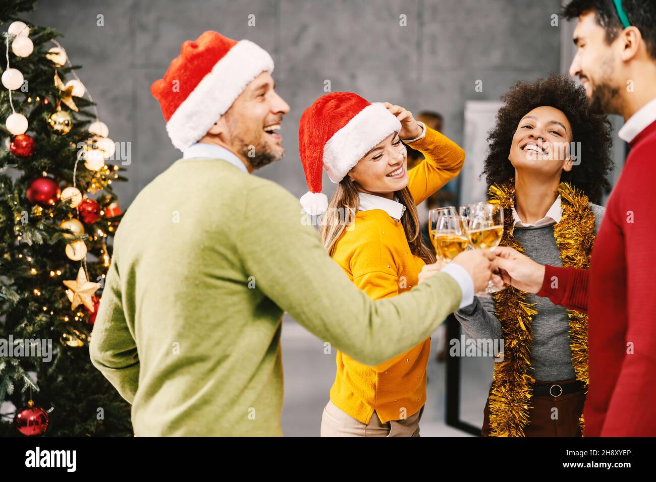 New Year's party at the firm. A group of multicultural colleagues ...