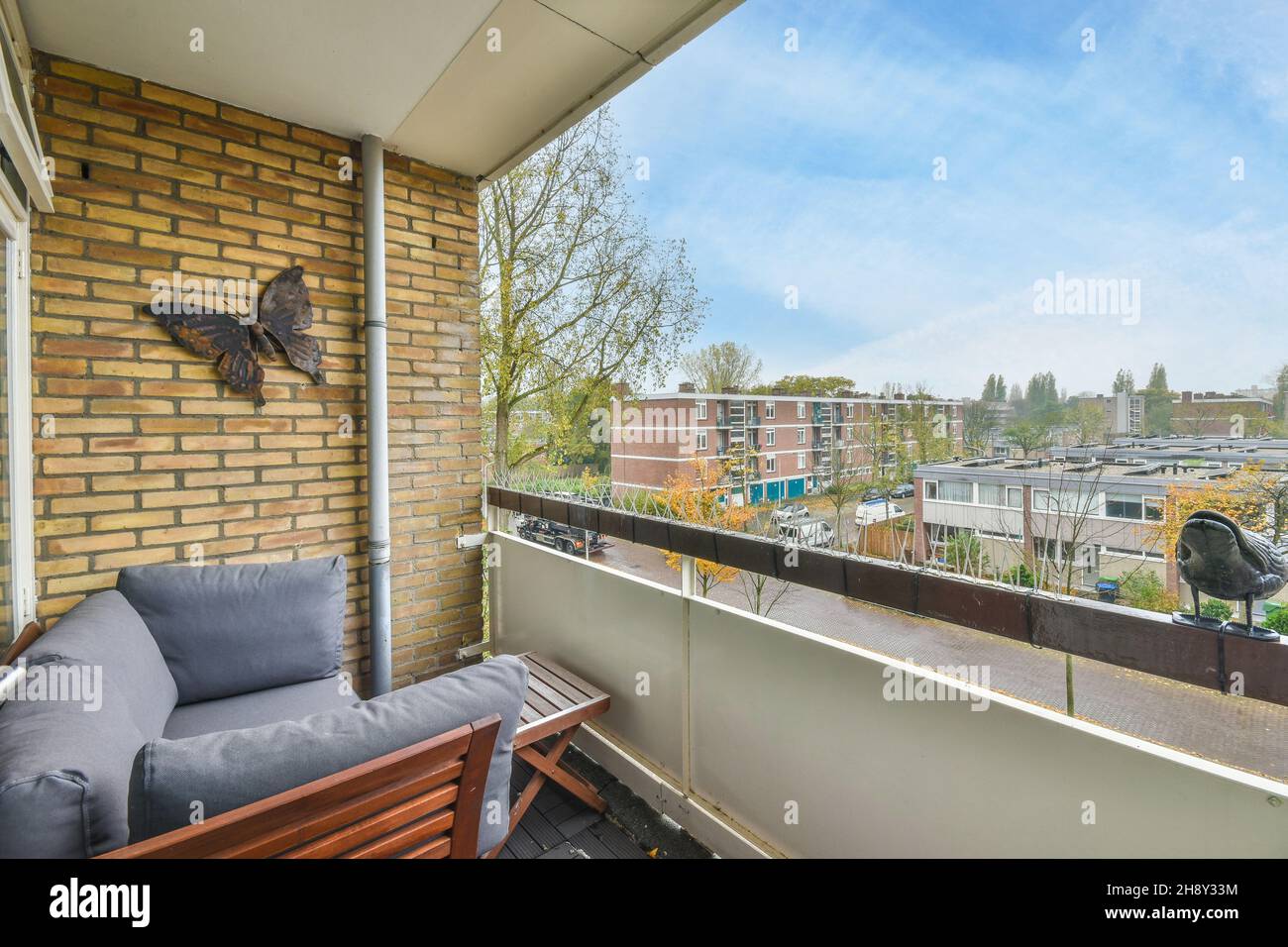 Balcony of a beautiful house in the daytime Stock Photo - Alamy