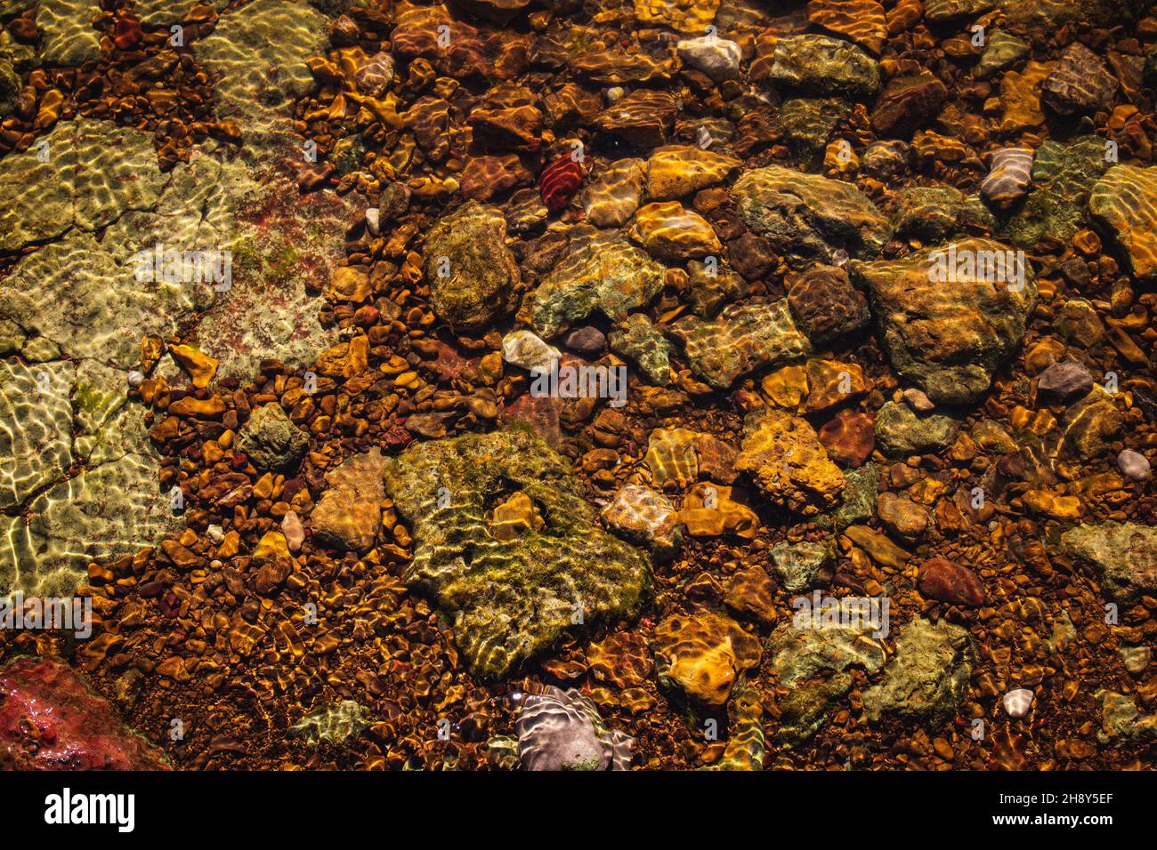 Birds eye view of rocks in water Stock Photo - Alamy