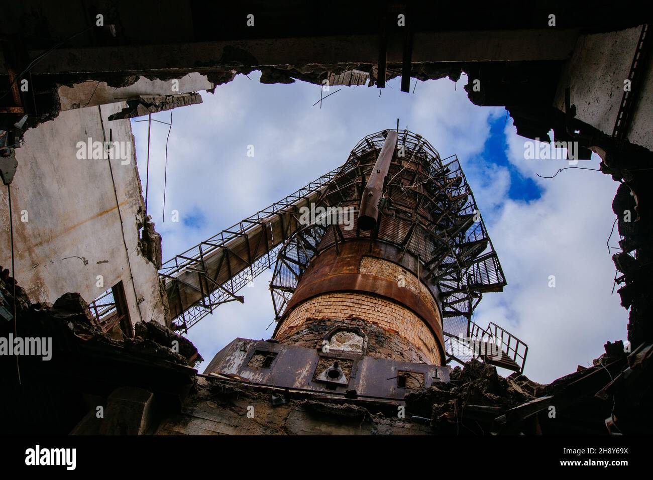 Old rusty abandoned rectification column, bottom view from hole Stock ...
