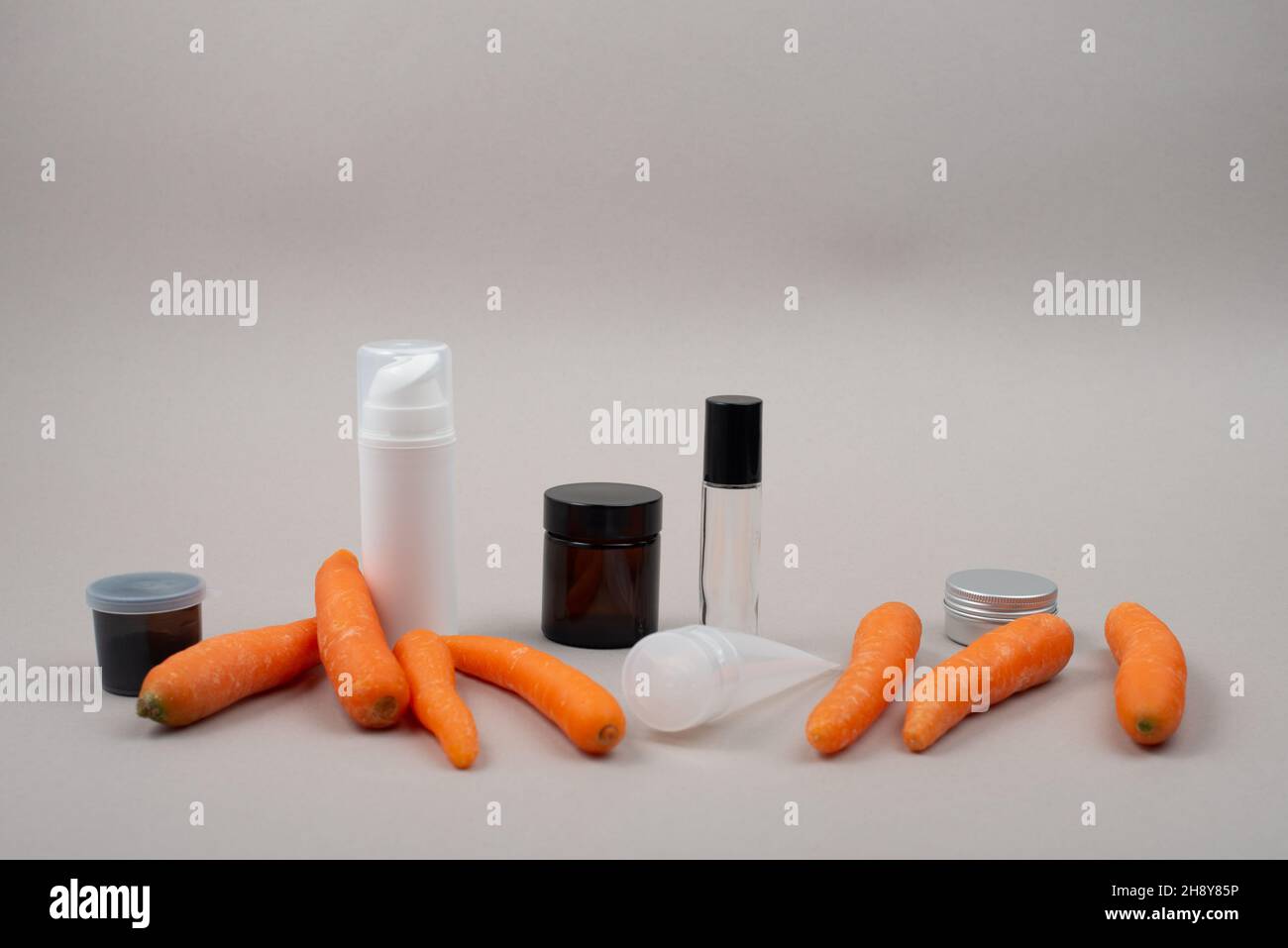 Set of different containers for carrot home made cosmetics Stock Photo ...