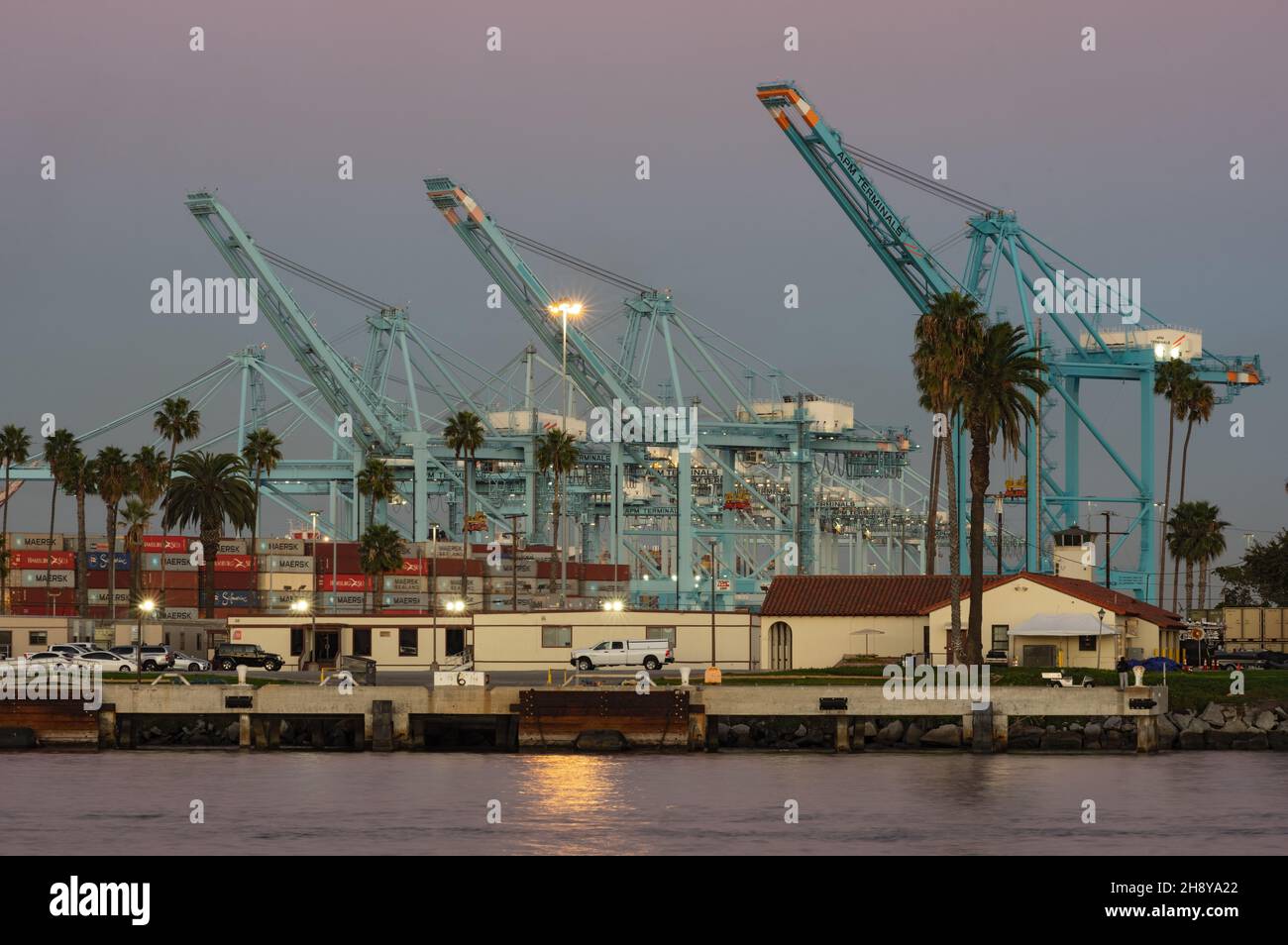 Coast Guard Base and APM Terminals Pacific shown at dusk in the Port of ...