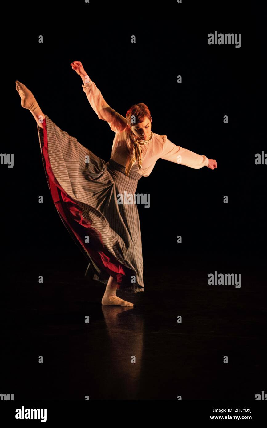 High contrast lighting of dancers on stage during dress rehearsal Stock ...