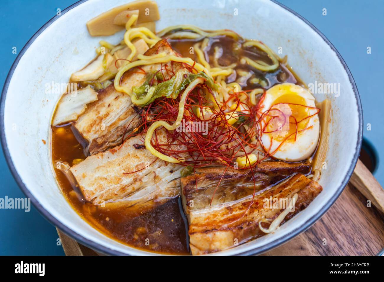 Bowl of Miso Pork Ramyun with pork and chicken broth, straight noodles ...
