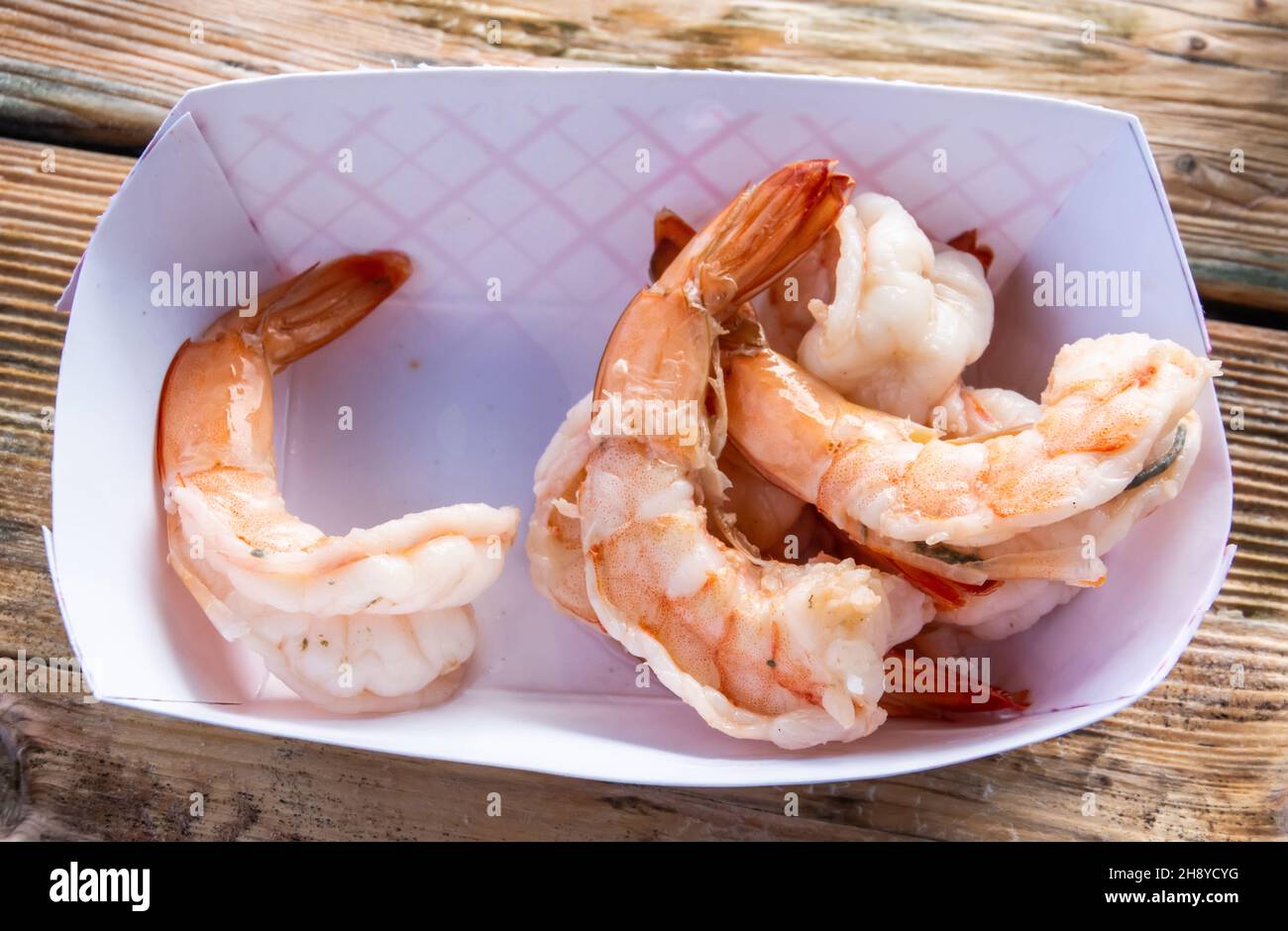 Basket of shelled cooked prawns in the United States of America Stock ...