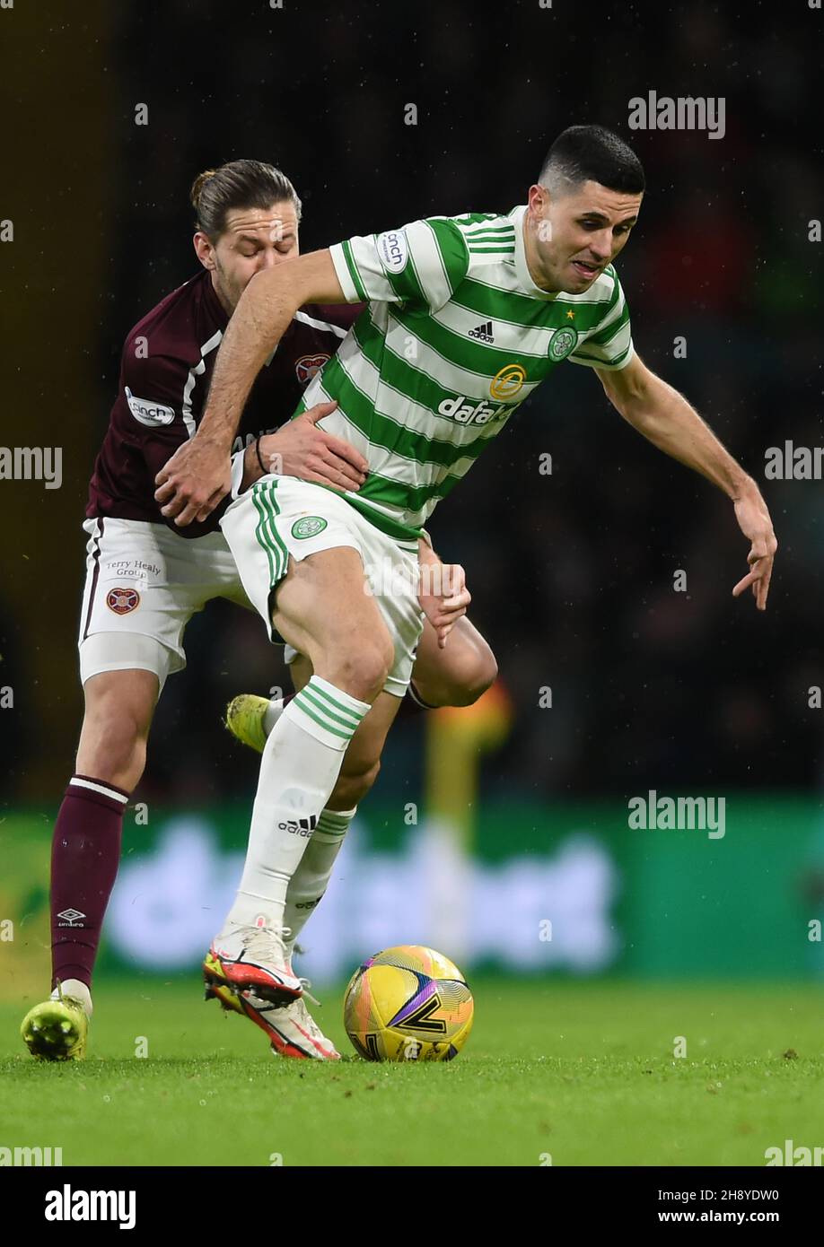 Glasgow, Scotland, 2nd December 2021. Peter Haring of Hearts and Tom ...