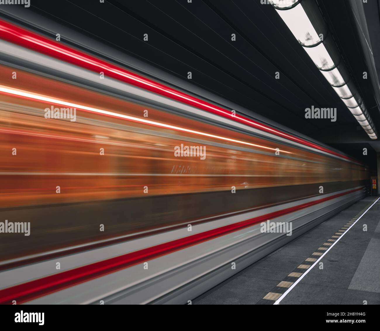 Scenic shot of a metro train illuminated in motion Stock Photo - Alamy