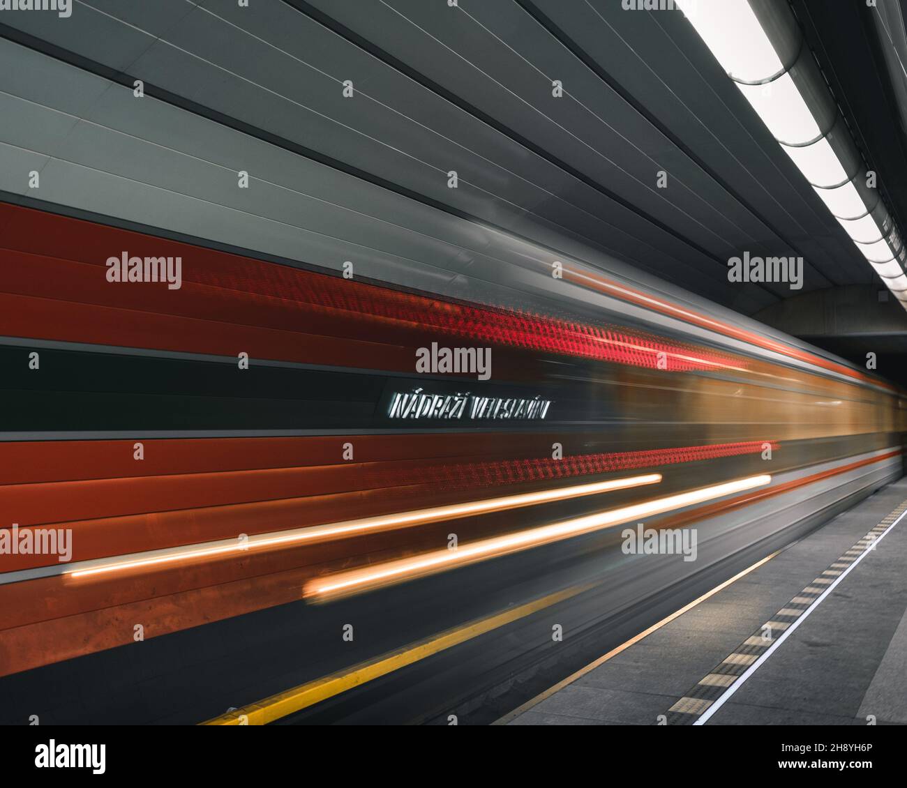Scenic shot of a metro train illuminated in motion Stock Photo - Alamy