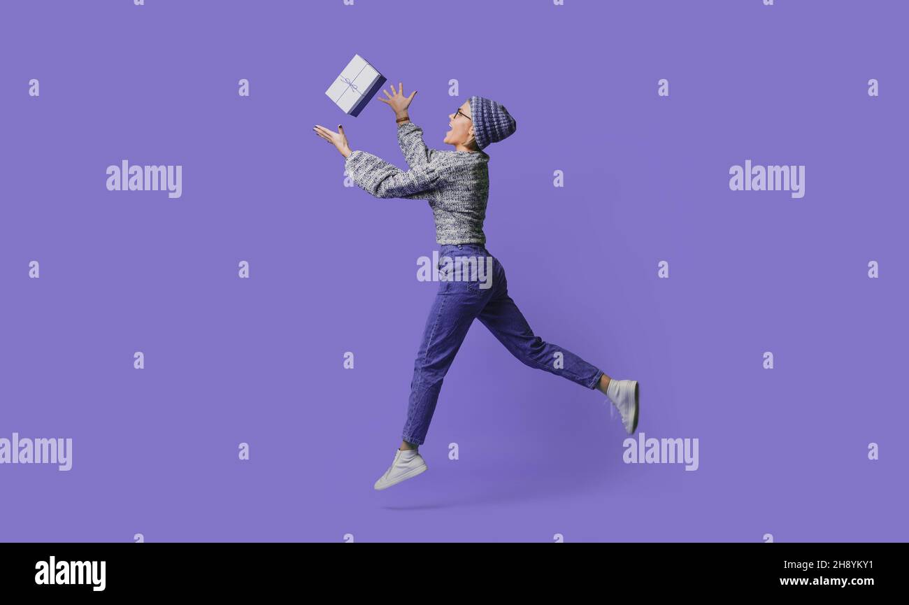 Full length side view photo of shocked caucasian woman wearing knitted ...