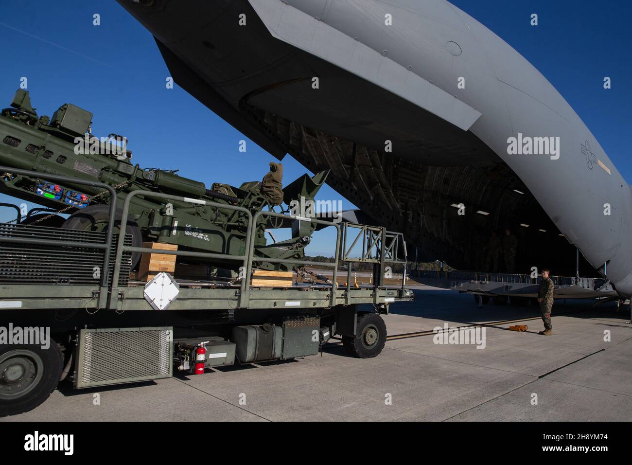U.S. Marines with Combat Logistics Company (CLC) 21 and U.S. Airmen ...