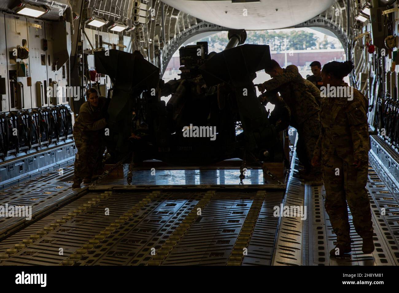 U.S. Marines with Combat Logistics Company (CLC) 21 and U.S. Airmen ...