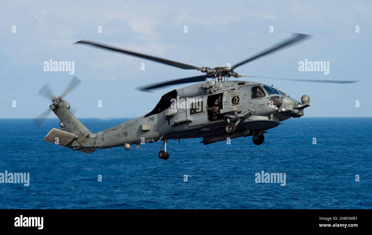 211202-N-MD461-1545 PHILIPPINE SEA (Dec. 2, 2021) An MH-60R Sea Hawk ...