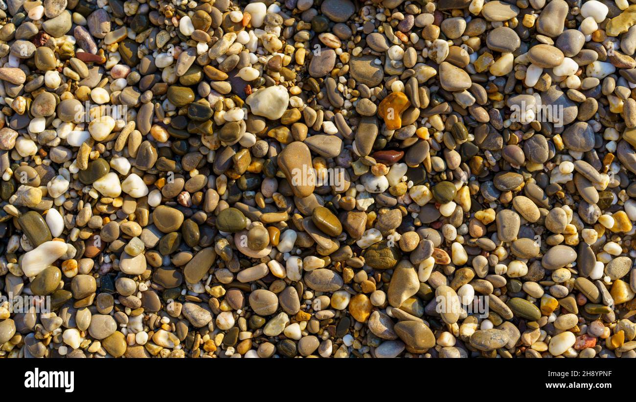 Natural textured background of multicolored pebbles Stock Photo - Alamy