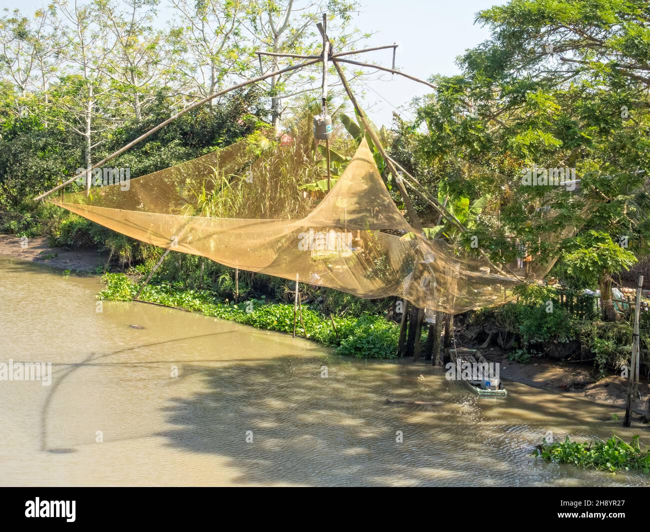 Fishing net over canal hi-res stock photography and images - Alamy