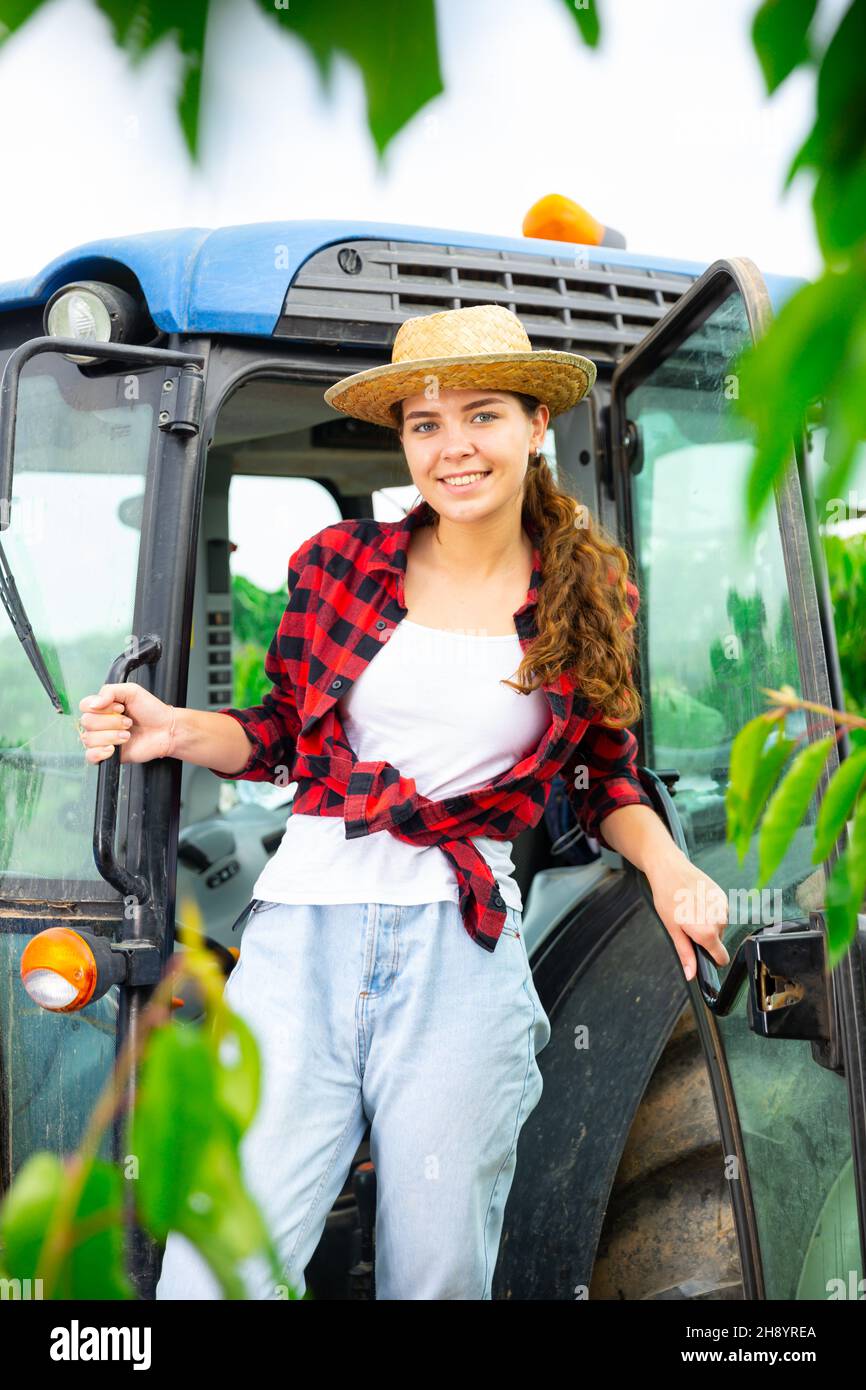 Woman driving tractor cabin hi-res stock photography and images - Alamy