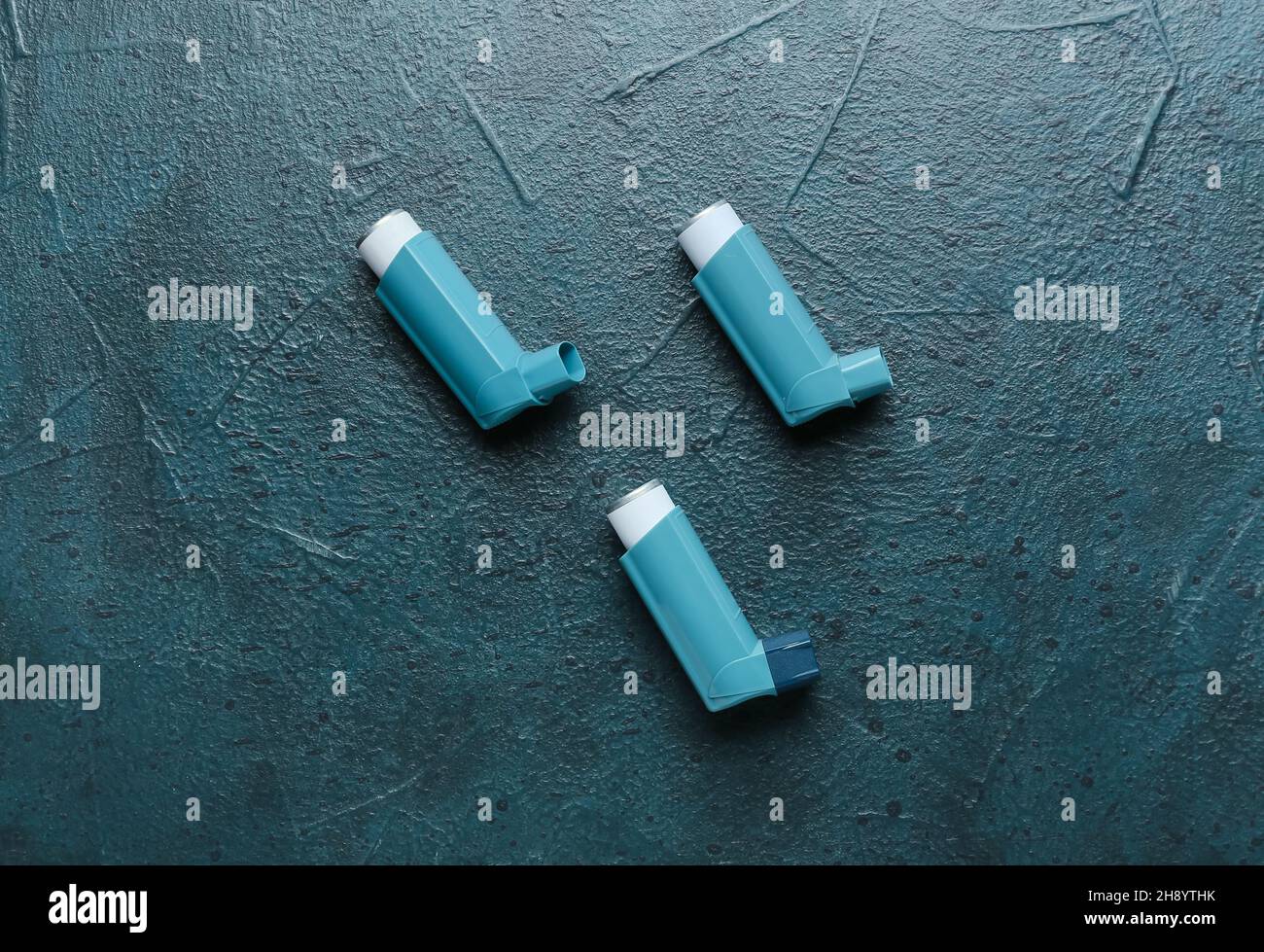 Asthma inhalers on dark background Stock Photo - Alamy