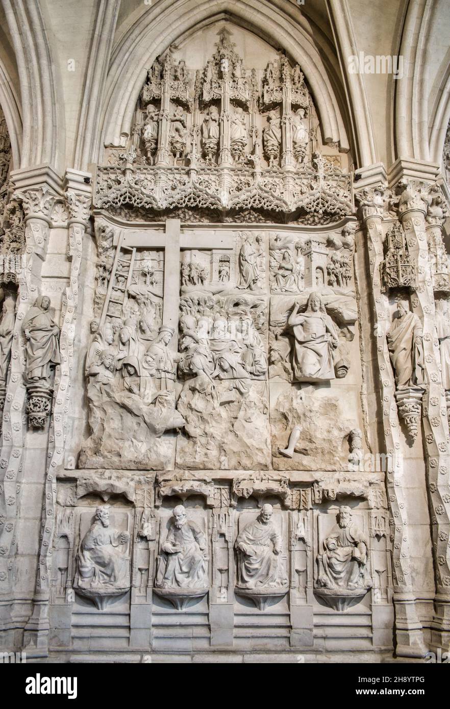 Vertical shot of low relief in the cross-stone on the back of the ...