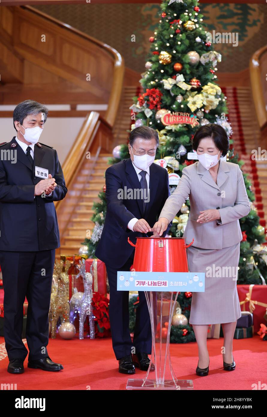 03rd Dec, 2021. Moon's donation President Moon Jae-in and his wife, Kim ...