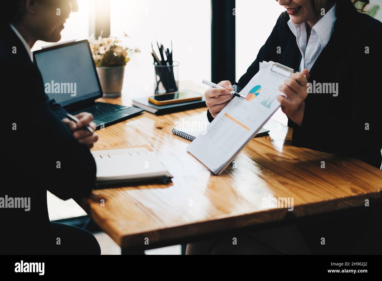 Business people brainstorm meetings to discuss and analyze business ...