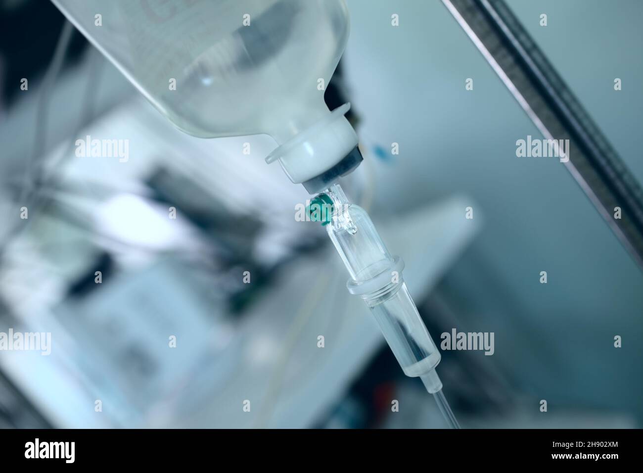 Iv dropper on the steel pole in the hospital ward Stock Photo - Alamy