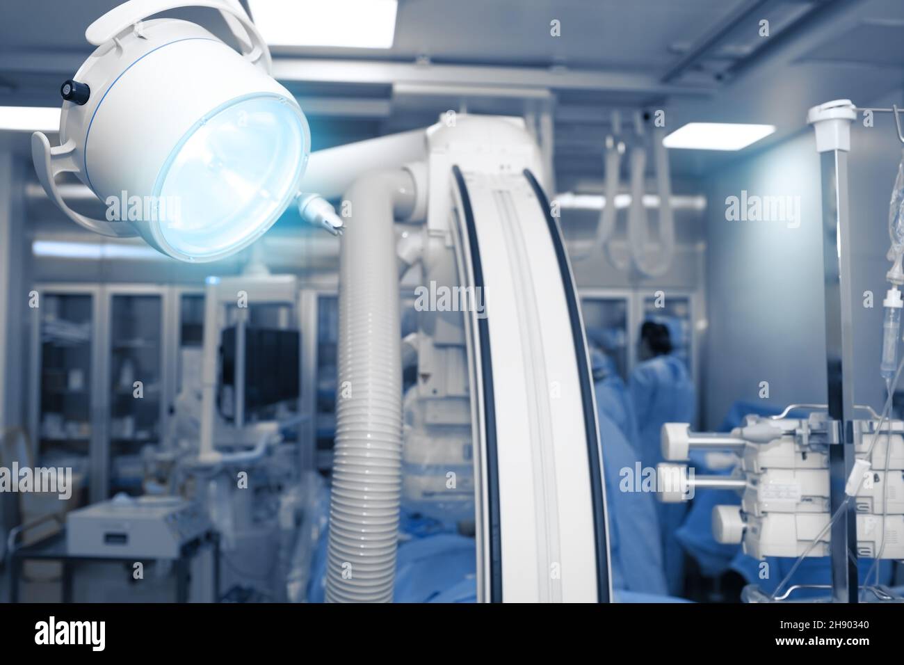 Working medical team in the interventional surgery room Stock Photo - Alamy