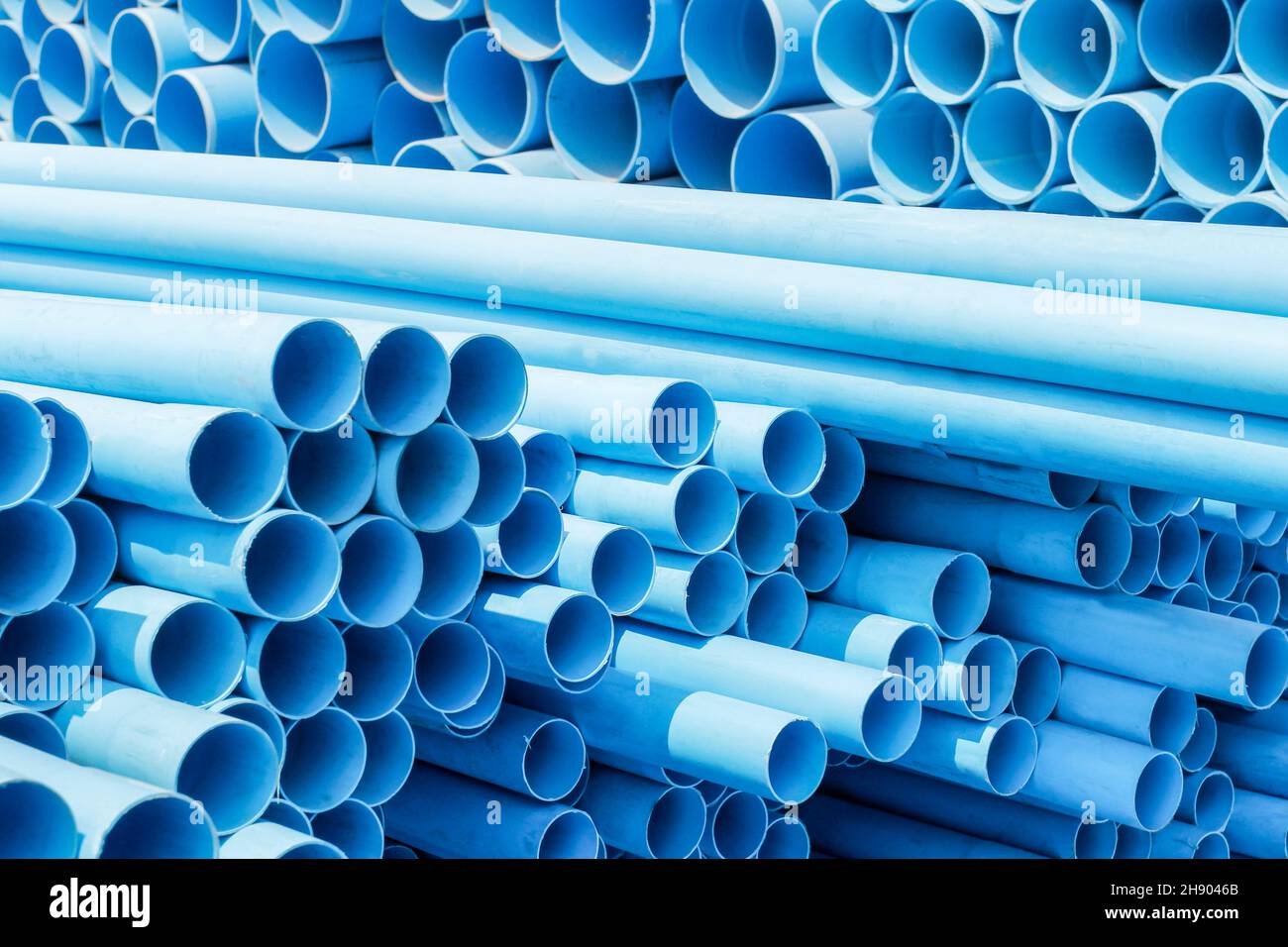 Blue PVC pipes Stock Photo - Alamy