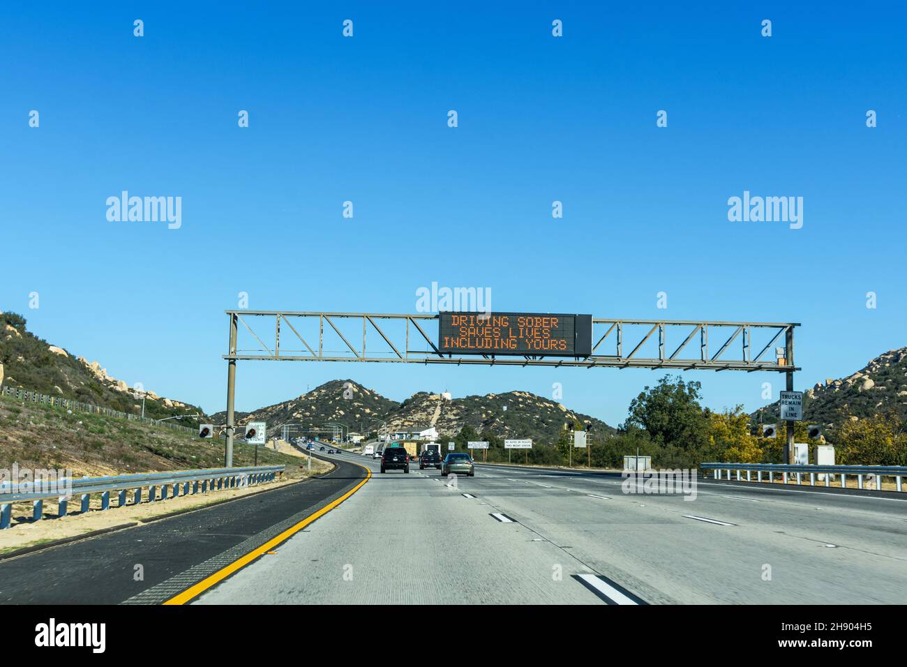 Driving Sober Saves Lives Including Yours warning message on a digital ...