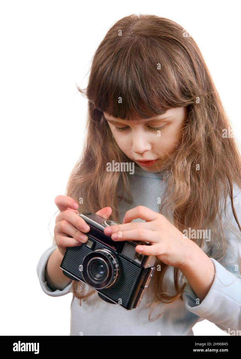 Little Girl with Retro Photo Camera Isolated on the White Background ...