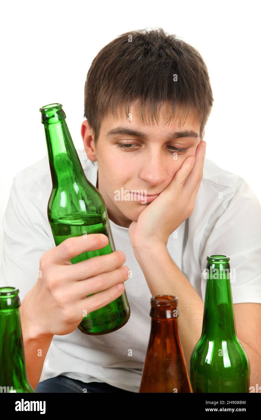 Sad Young Man in Alcohol Addiction on the White Background Stock Photo ...
