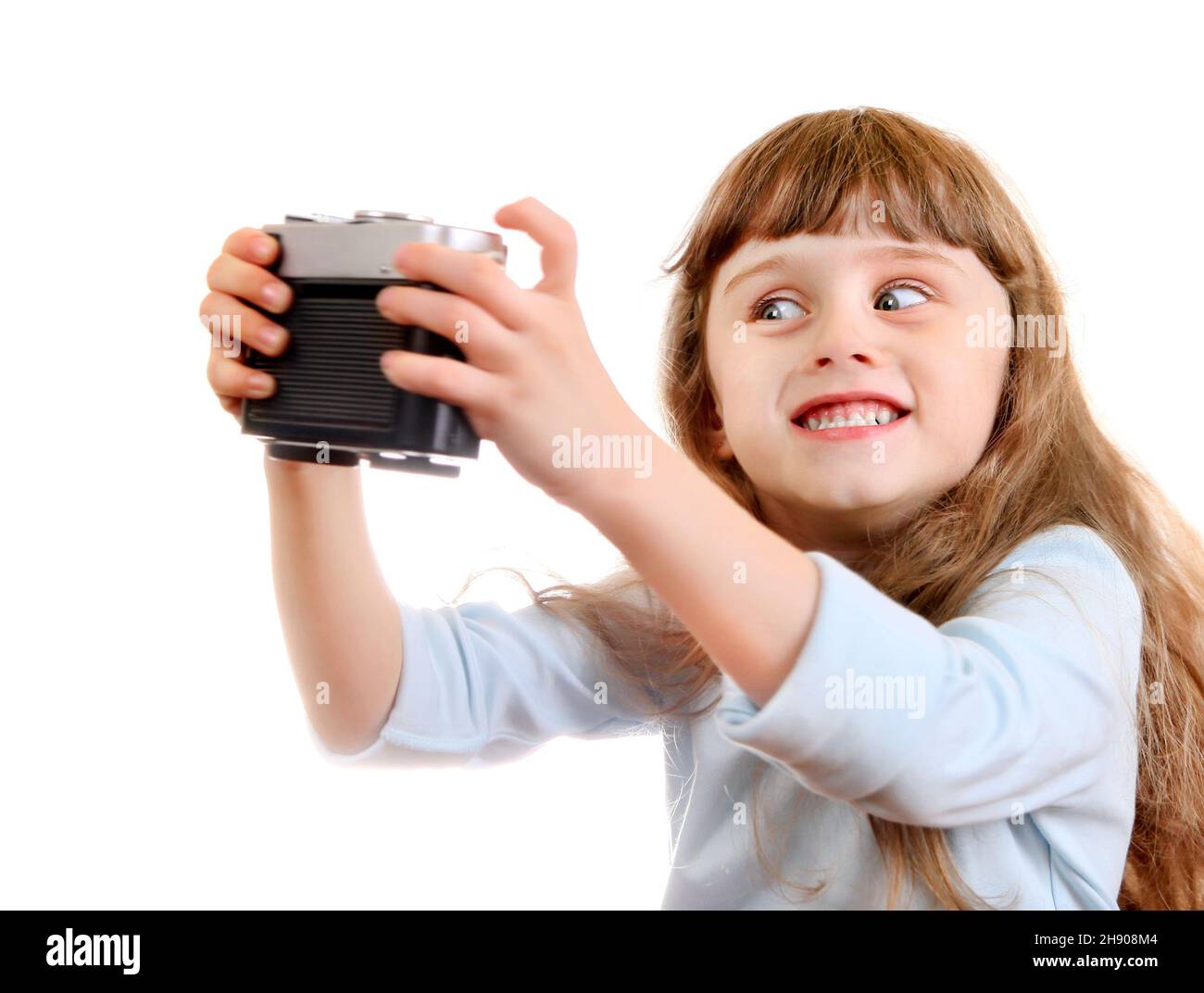 Cheerful Little Girl make a Selfie with Retro Photo Camera on the White ...