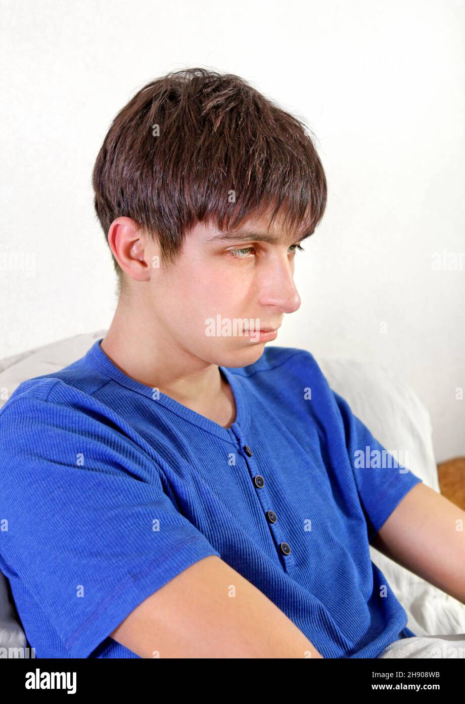 Side view portrait male sad hi-res stock photography and images - Alamy