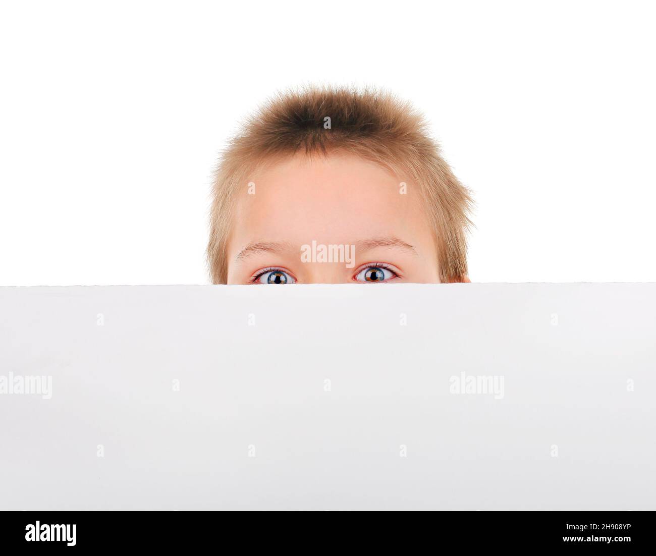 Surprised Kid behind the Blank Paper on the White Background Stock ...