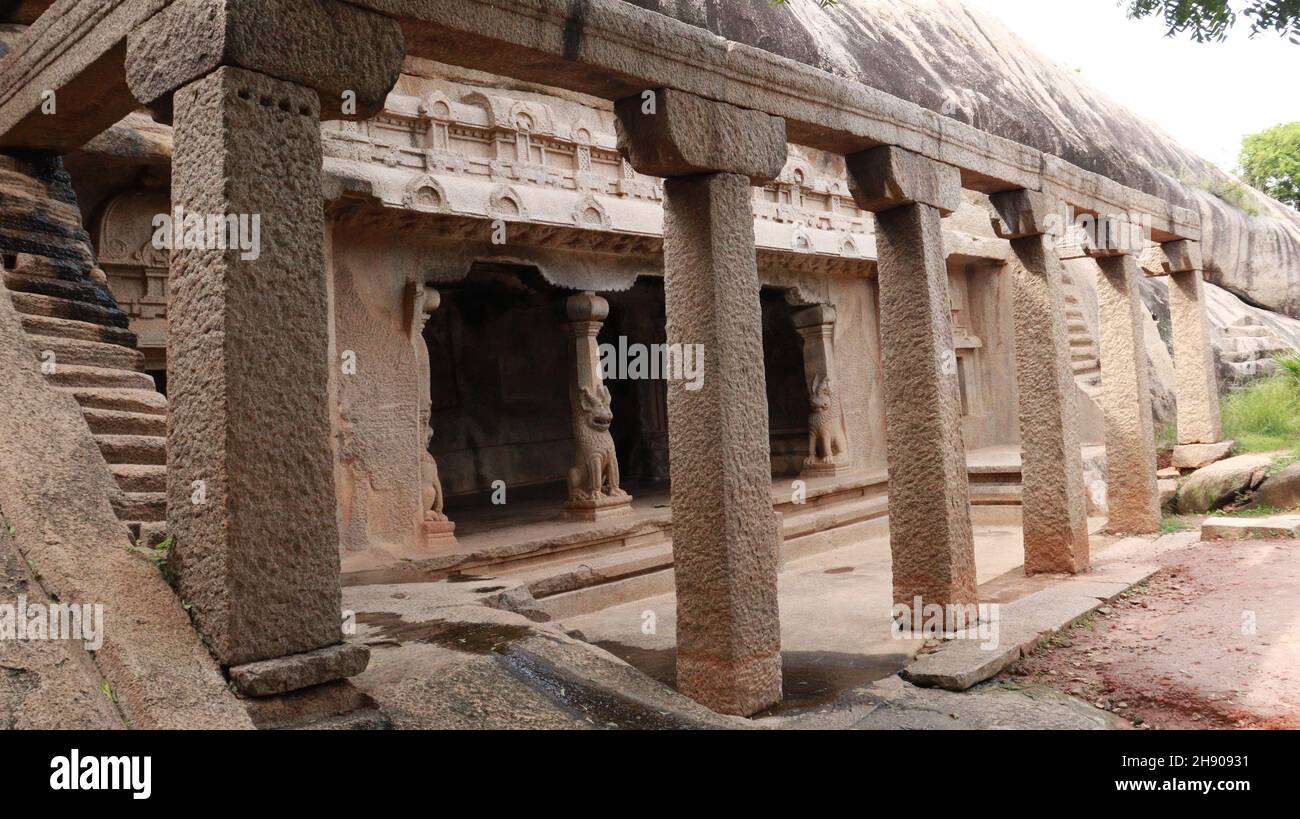 Cave stone hall carved in the rock with pillars in the cave background ...