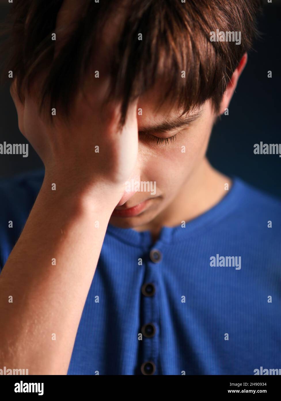 Sad man in dark room hi-res stock photography and images - Alamy