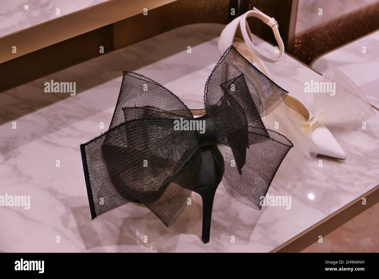 JIMMY CHOO SHOES ON DISPLAY INSIDE THE FASHION STORE Stock Photo - Alamy
