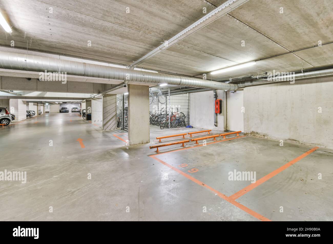 Modern nice looking garage and bicycle parking space Stock Photo - Alamy