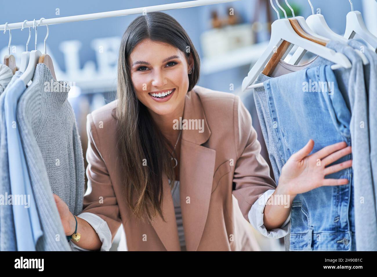 Retail customer salesperson clothes hi-res stock photography and images ...