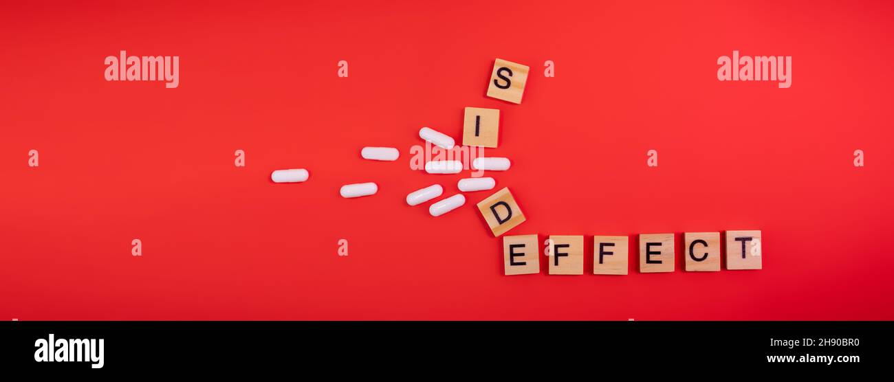 Words side effect on colored red paper texture background. Concept ...