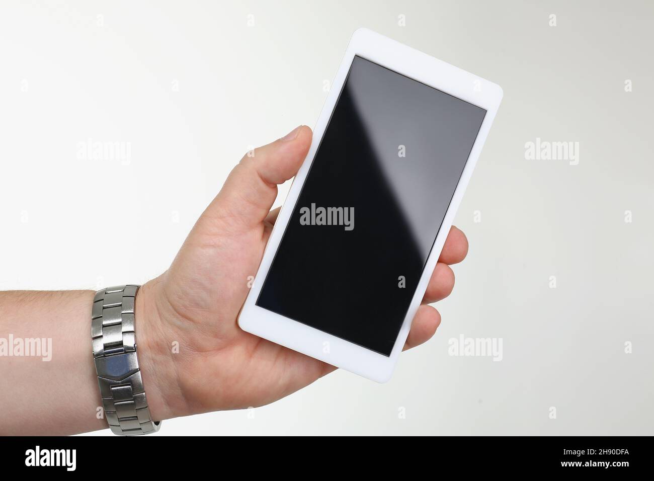Man hold cellphone with locked or turned off black screen Stock Photo ...